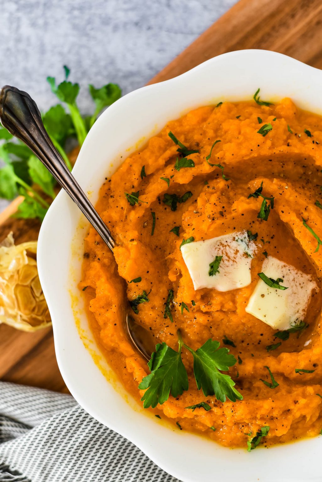 Roasted Garlic Mashed Sweet Potatoes - The Gingered Whisk