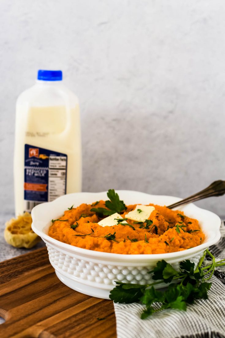 Roasted Garlic Mashed Sweet Potatoes - The Gingered Whisk