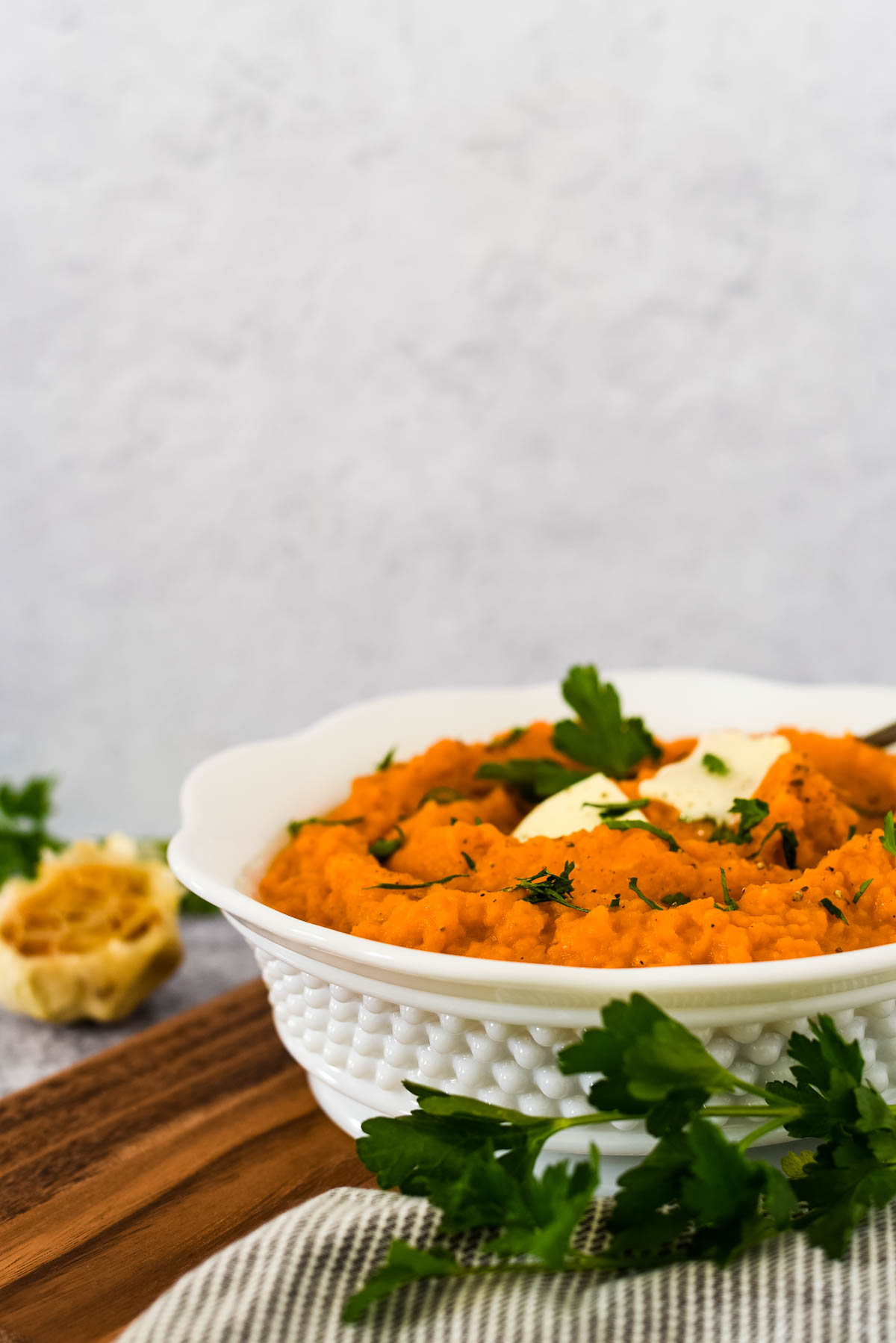Roasted Garlic Mashed Sweet Potatoes - The Gingered Whisk