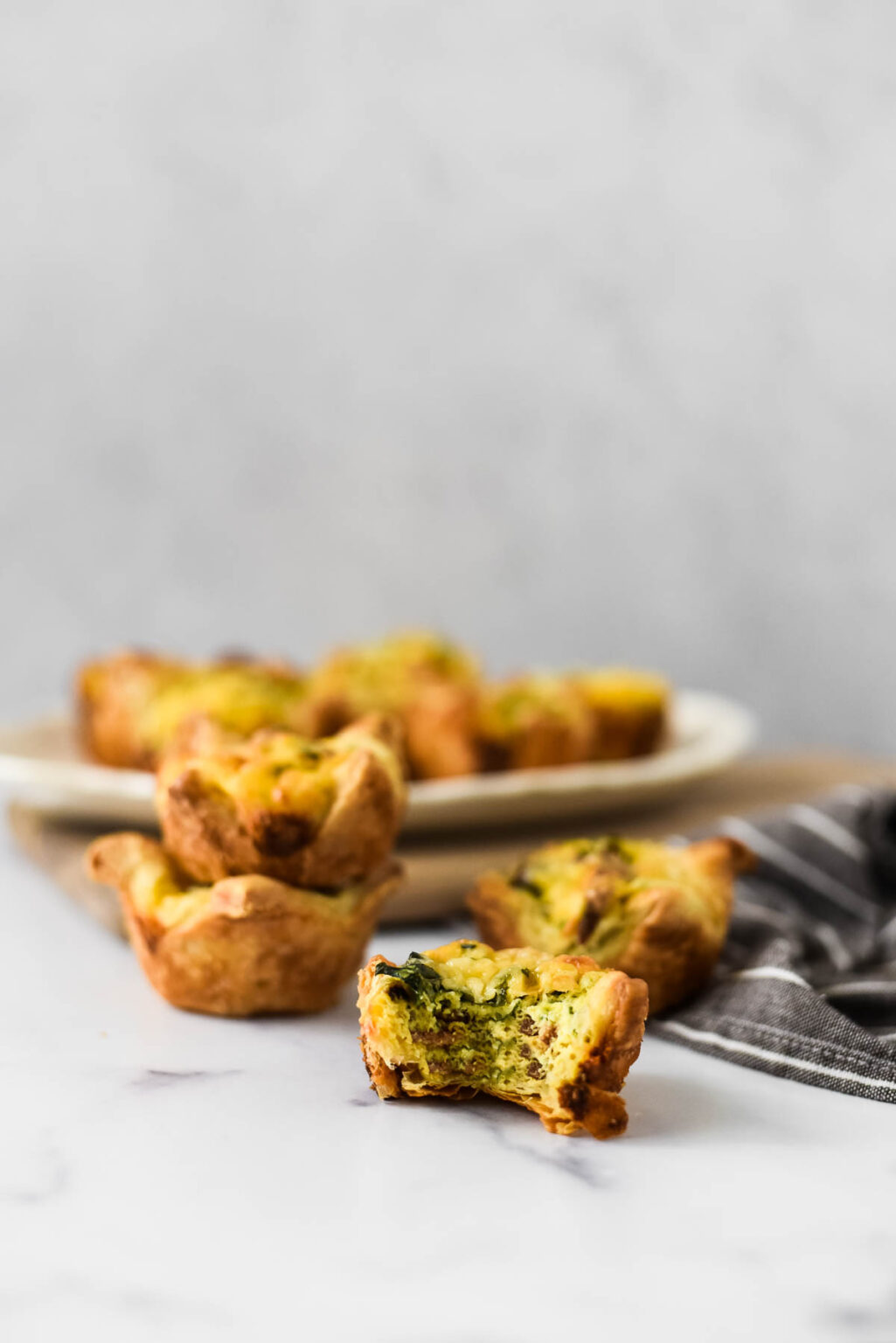 Mini Puff Pastry Quiche with Bacon and Spinach - The Gingered Whisk