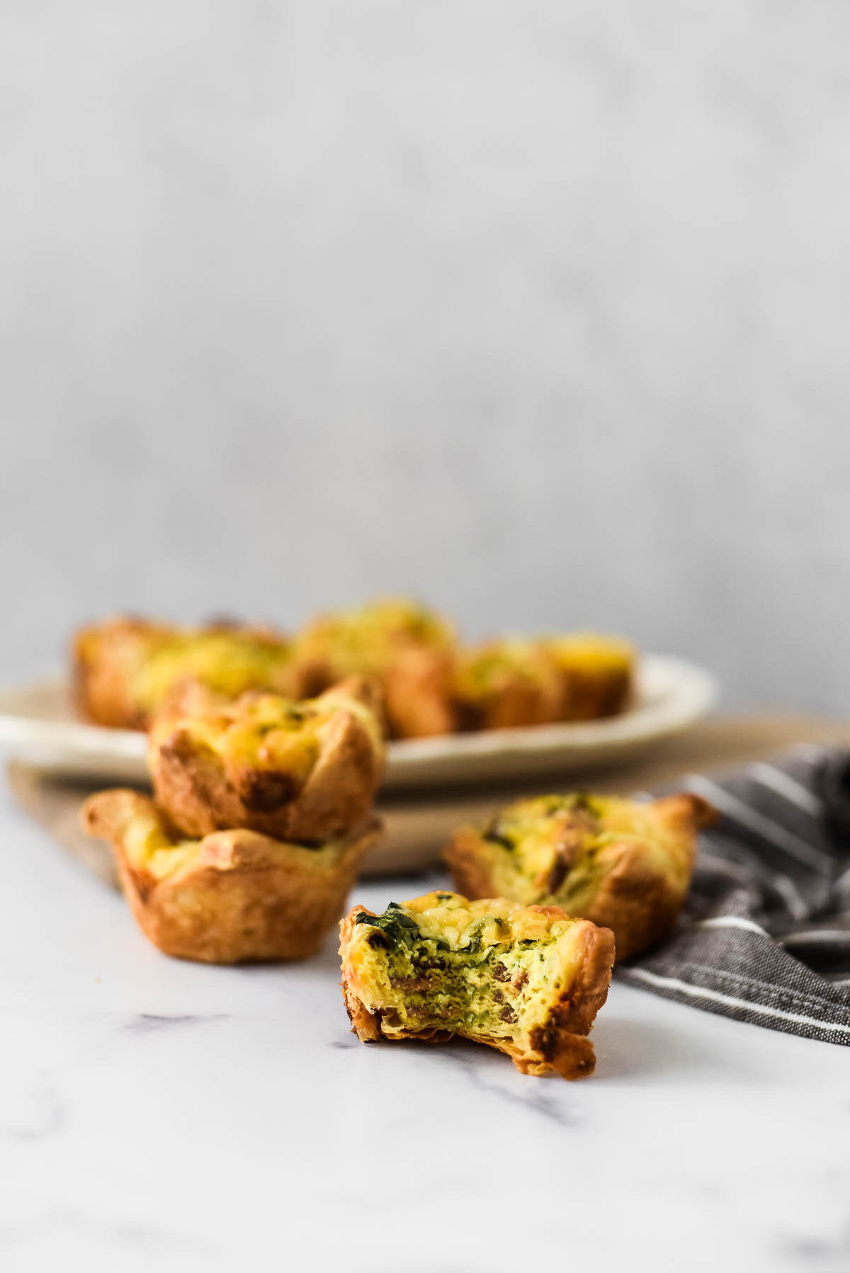Mini Puff Pastry Quiche with Bacon and Spinach - The Gingered Whisk